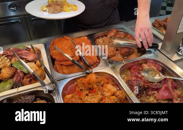 various Buffet restaurant with a large selection of meat and vegetables ...