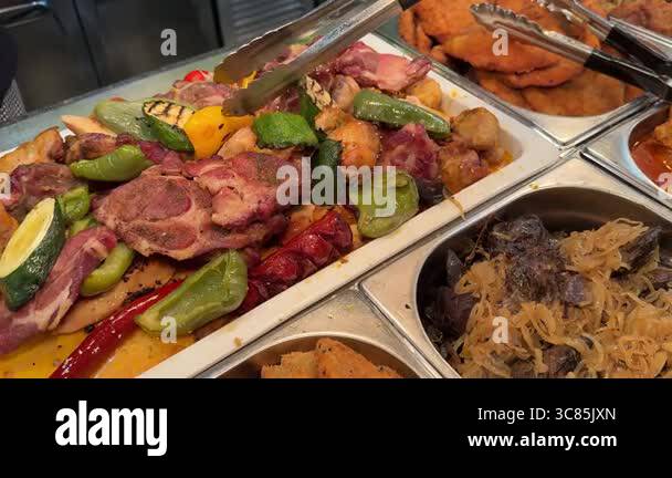 various Buffet restaurant with a large selection of meat and vegetables ...