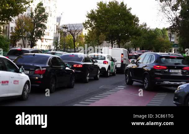 Car congestion at rush hour, car pollution and traffic jam in European ...