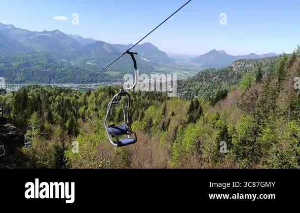 Experience the thrill of soaring over lush, green expanses as a cable ...
