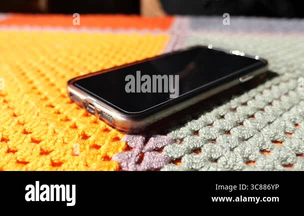 hand pick a smart phone from a table Stock Video Footage - Alamy