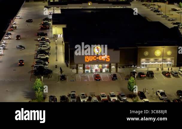 Drone night wide footage of Buc-ees gas station in Calhoun, Georgia. Calhoun, GA. USA 22 mart ...