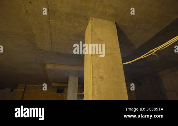 Vertical supports stand firm beneath transit space. Metro structure ...