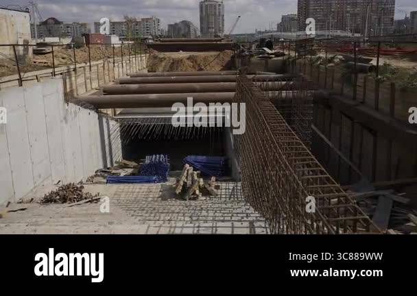 Construction of subway entrance tunnel with reinforcements and masonry ...