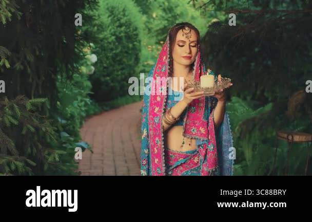 Beautiful fantasy oriental woman dancing ritual dance. Indian style ...