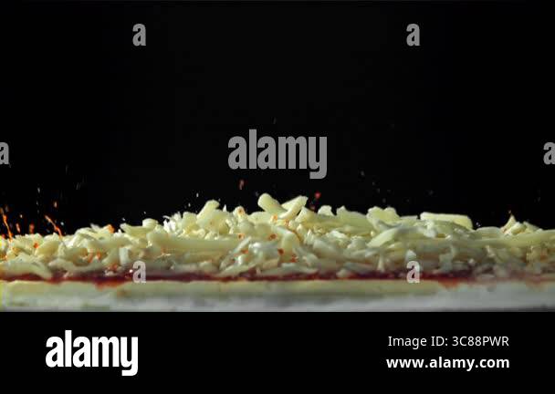 Making pizza. Pizza falls on the table. Filmed on a high-speed camera ...