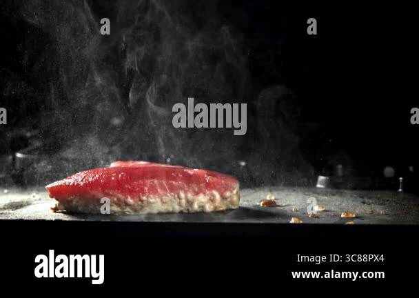 Grilled tuna steak. Filmed on a high-speed camera at 1000 fps. High ...