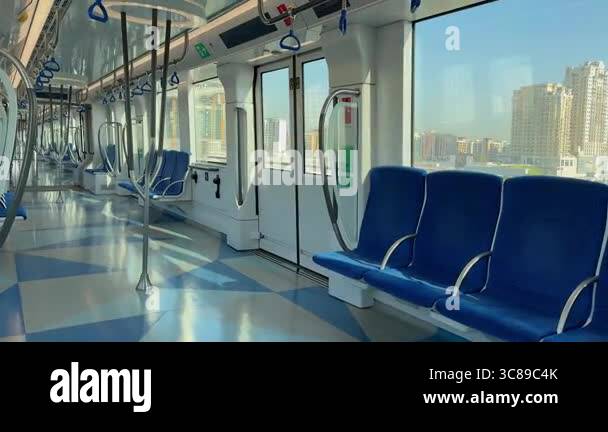 Inside view of modern Dubai metro train. The clean and empty metro ...