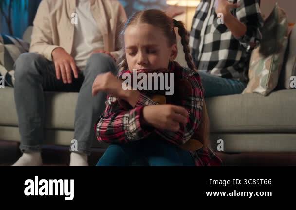 Sad child girl kid daughter upset suffering hugging toy Teddy bear ...