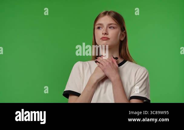 Teens emotions concept. Teenage girl posing at camera with mad upset ...