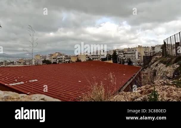Zoom out time lapse video shows a view of Athens city-Greece with ...