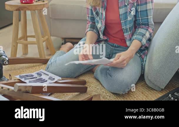 Woman reading manual instruction Stock Videos & Footage - HD and 4K ...
