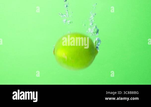 Juicy Lime Under Water. Slow Motion Citrus Drop Stock Video Footage - Alamy