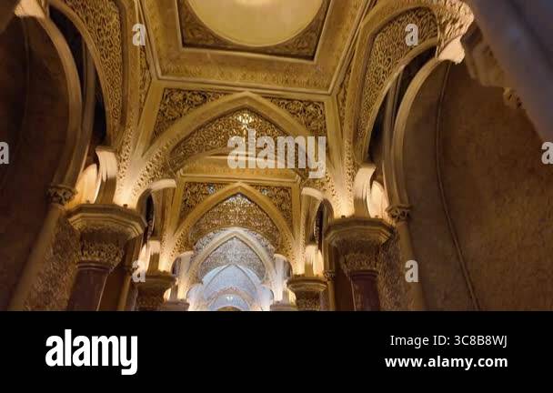 Elegant palace room in Sintra with detailed ceiling, arched doorways ...