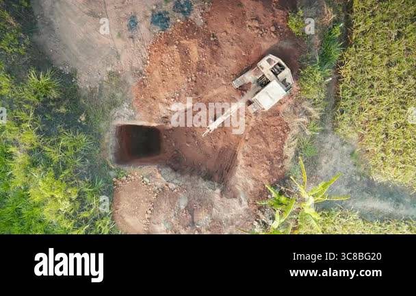 Backhoe machine equipment and soil work in top view. Construction by ...