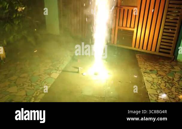 Luminous sparkles from fireworks in a vibrant outdoor nighttime scene ...