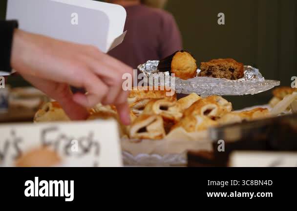 Cafe with freshly served baked food candid shot medium 4k shot ...