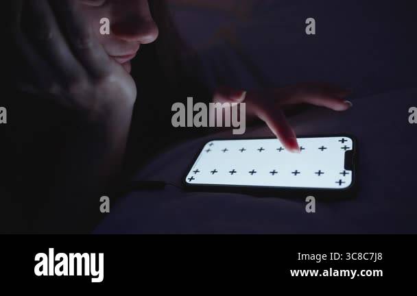 Woman Holding Head with One Hand While Scrolling Smartphone with ...