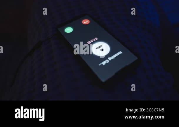Nighttime Scam Call Wakes Woman in Bed Who Looks at Phone and Rejects the Call While Resting ...