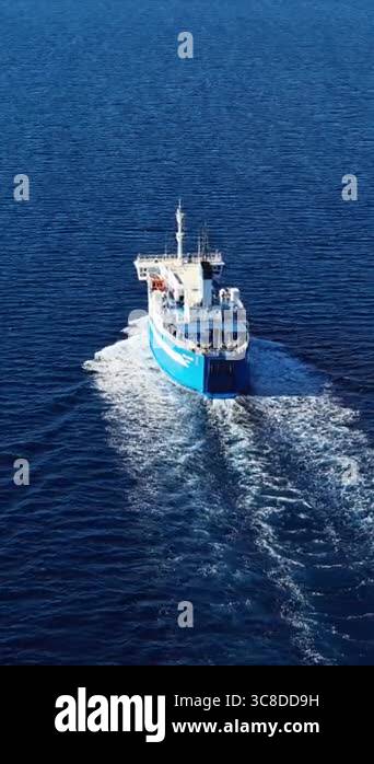 Ferry on open water cruising between Greek islands. Drone camera ...