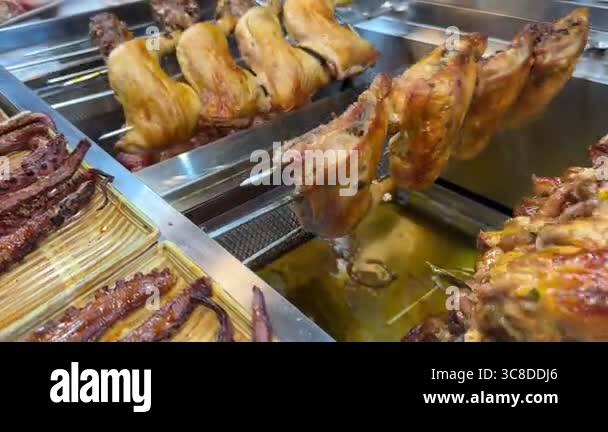 Rotisserie roasted poultry Vietnamese Street Food oven cooking multiple ...