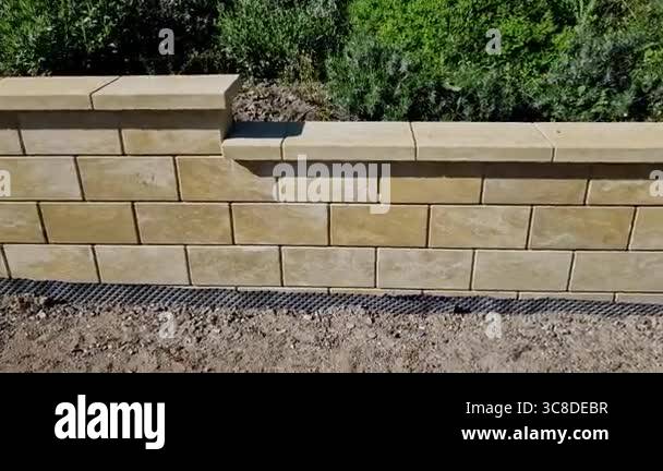 Retaining wall at the monument. Foil insulates the damp soil. Staircase ...