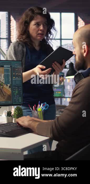 Vertical Video Architectural design team configures a floor plan on ...