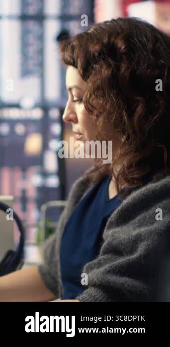 Vertical Video Female freelancer uses online AI assistant to automate text generation and solve ...