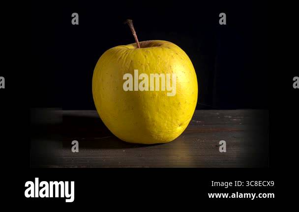 Close up of a decaying apple, on black background Stock Video Footage ...