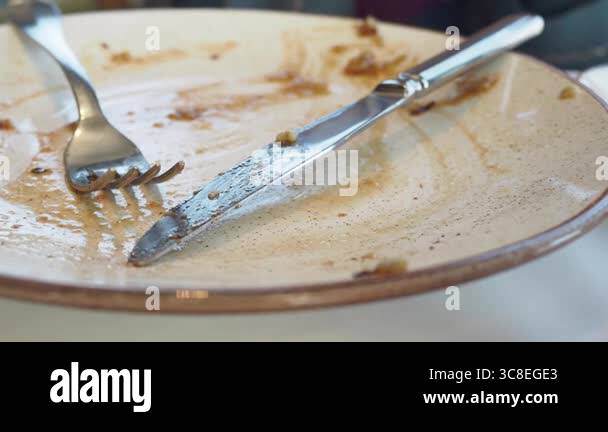 Utensils rest on clean plate Stock Videos & Footage - HD and 4K Video ...
