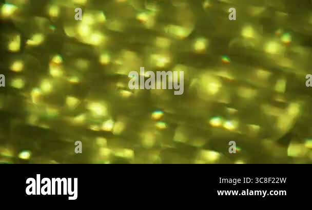 Blurred sparkle. Festive glimmer. Yellow green colorful gleaming ...