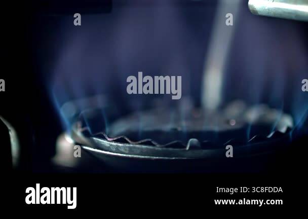 Gas burns in the kitchen burner. Filmed on a high-speed camera at 1000 ...