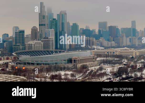 Aerial view of a snowy urban Soldier field in Chicago downtown ...