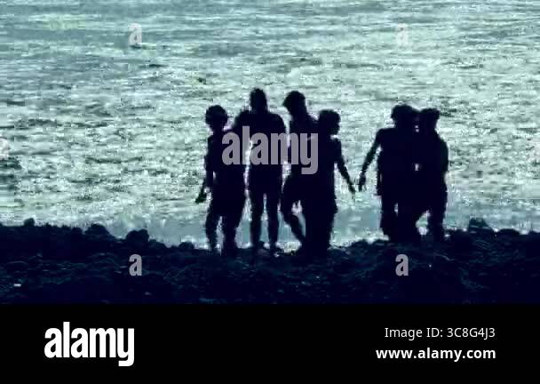 Rishikesh, India January 24, 2025: The silhouette of young boys is ...