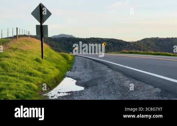 Winding rural road traffic signs Stock Videos & Footage - HD and 4K ...