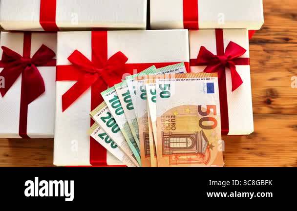 Gift Costs. Gift certificates. White gift boxes with red bow and euro ...