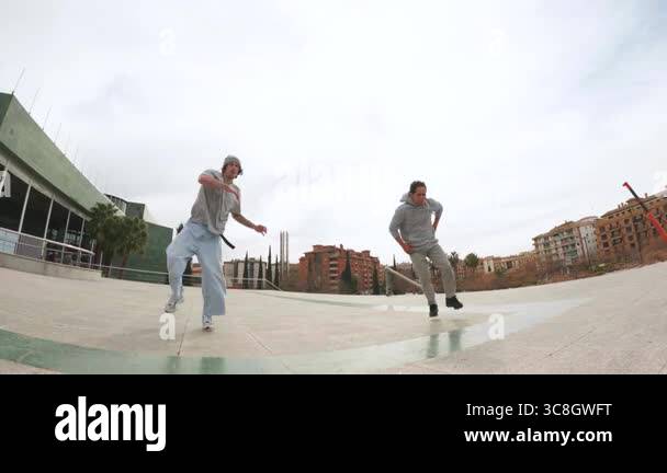 Dynamic breakdancers perfecting street dance skills, exchanging ...