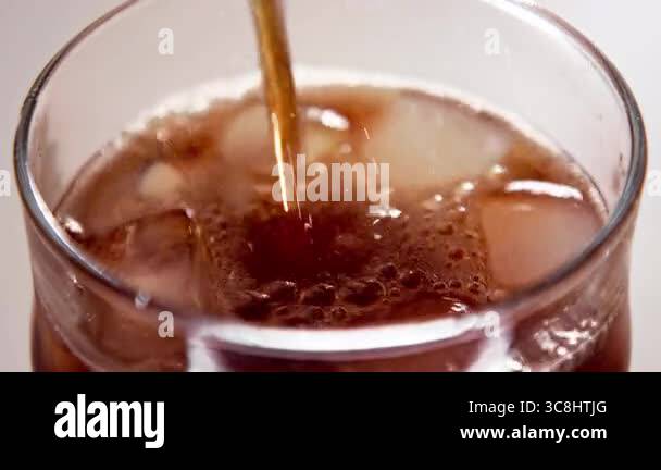 Drinking Coca of Glass Cup with Ice Cubes and Wet Surface Close Up ...