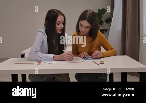 Students sit desk in Stock Videos & Footage - HD and 4K Video Clips - Alamy