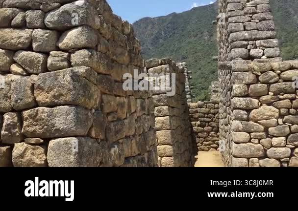 The crafted ancient stone walls of the Inca at Machu Picchu Stock Video ...