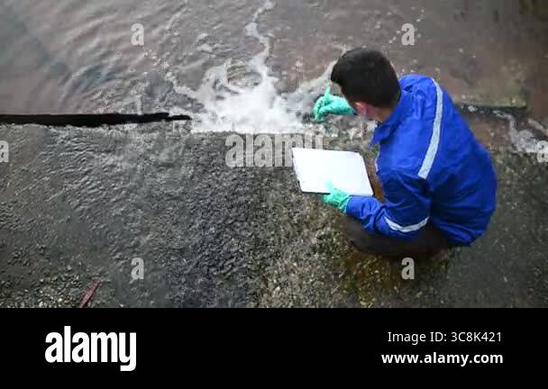 Environmental engineer inspecting water quality in wastewater Stock ...