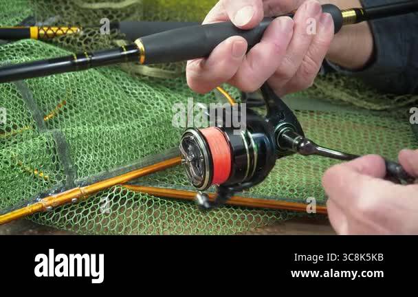Fisherman, engaged in installation and testing of fishing gear. Close ...
