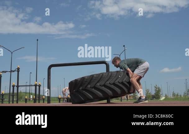 Young Caucasian male athlete training on sports ground Stock Video ...