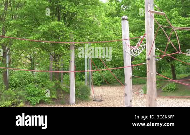 A challenging adventure playground featuring wooden structures and ...