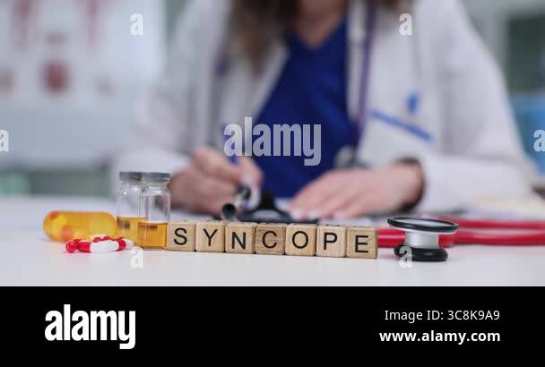 Female doctor writes prescription for Syncope treatment in clinic ...