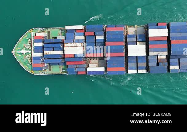Container ships carry large numbers of containers exported to various ...