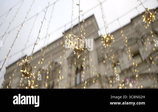 Glowing string lights creating a festive atmosphere against a blurred ...