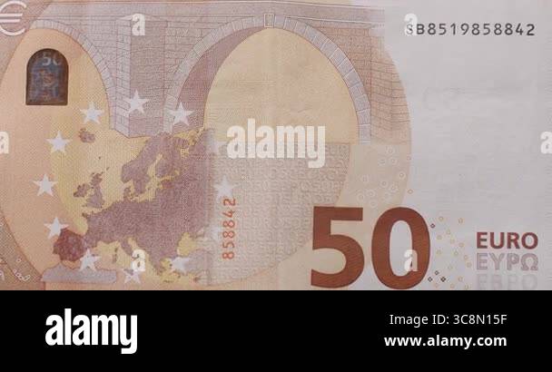 Zoom out motion 50 Euro bill on the back side. Fifty Euro money cash ...