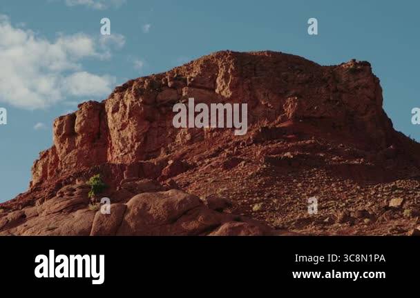 Majestic red rock formations in Morocco. The rugged landscape stretches ...