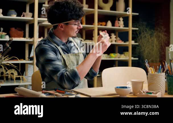 Art designer potter Caucasian man guy choosing color samples design ...